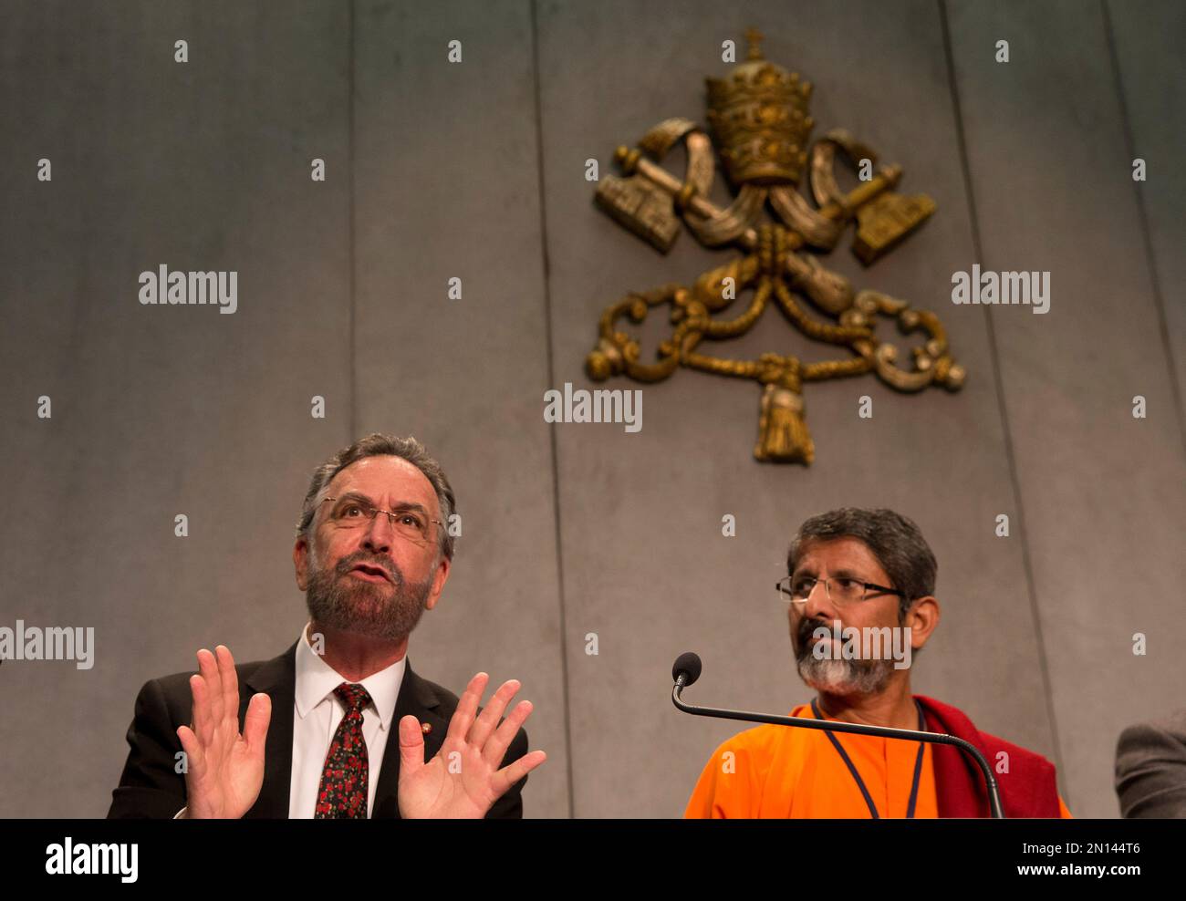 Rabbi David Rosen, left, flanked by Swami Chidananda Saraswati, talks ...