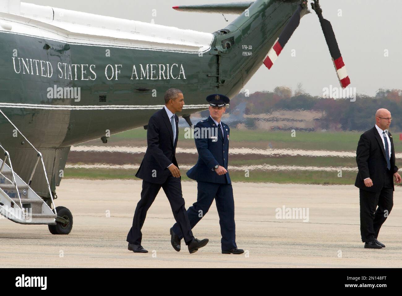President Barack Obama, accompanied by Vice Commander, of the 89th ...