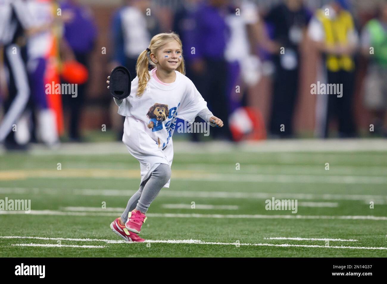 Layla Gilbert of Adrian Michigan is seen getting the tee from the ...