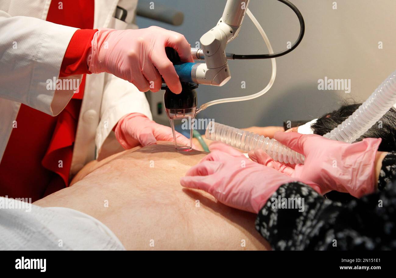 In this Sept. 26, 2015, photo, Dr. Jill Waibel, left, applies a laser ...
