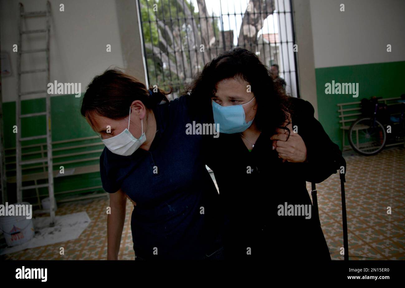 Elsa Garcia, left, wife of murdered pollster Rey David Copado Molina ...