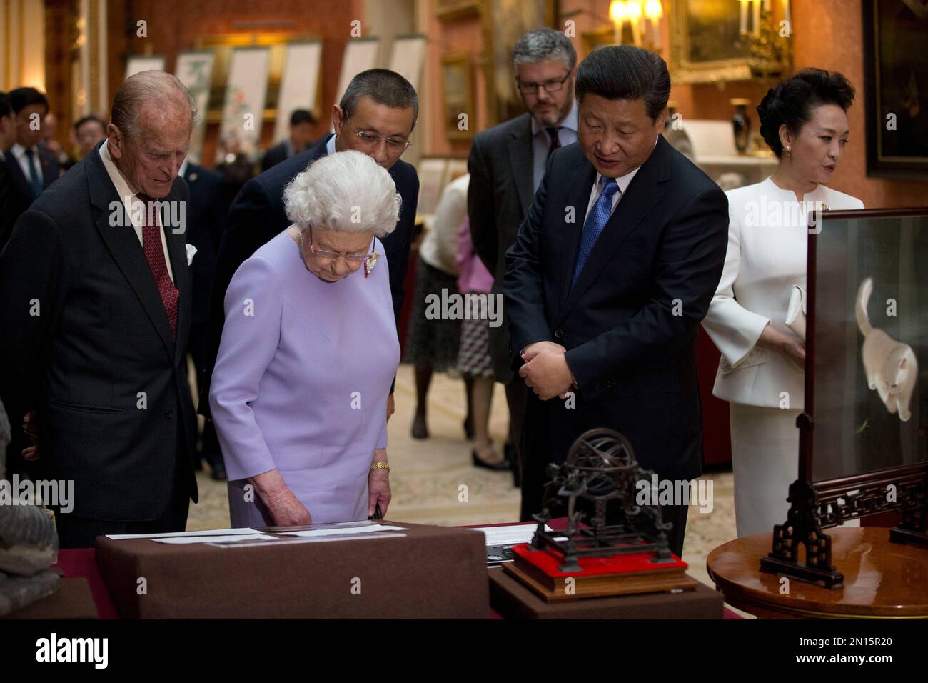 Chinese President Xi Jinping, second right, and his wife Peng Liyuan ...