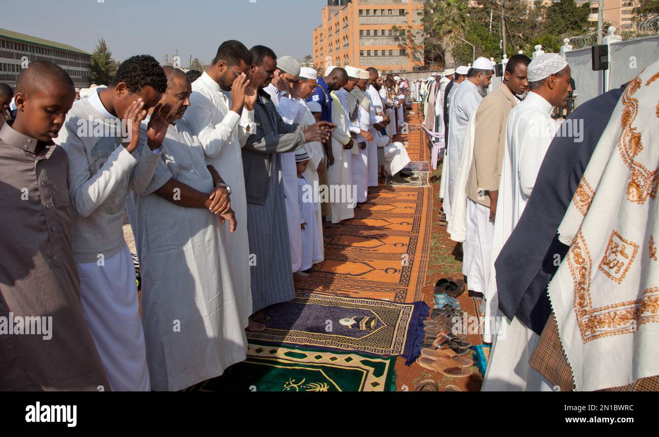Kenyan Muslims raise their hands as they offer prayers, Thursday, Sept ...