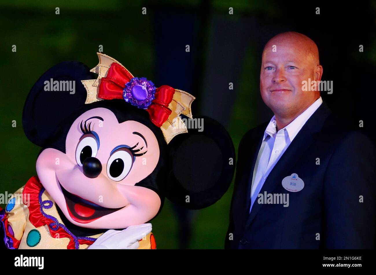 Chairman of Walt Disney Parks and Resorts Bob Chapek poses with Minnie ...
