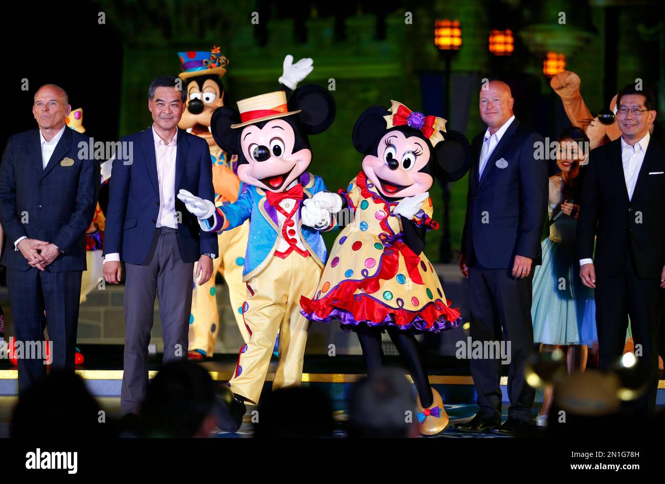 Chairman of Walt Disney Parks and Resorts Bob Chapek, second right, and ...