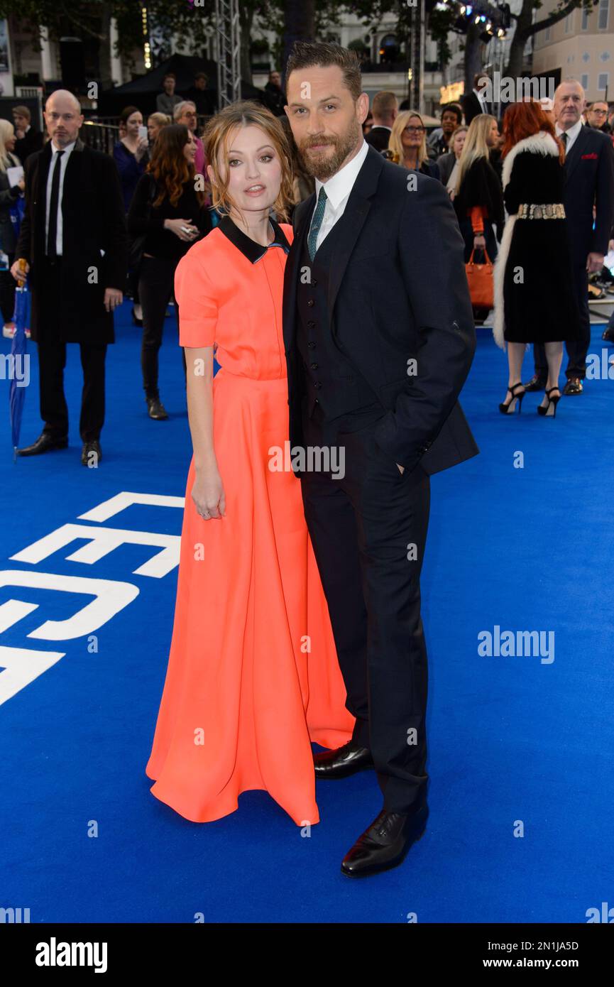 From left, Australian actress Emily Browning and British actor Tom Hardy pose for photographers ...