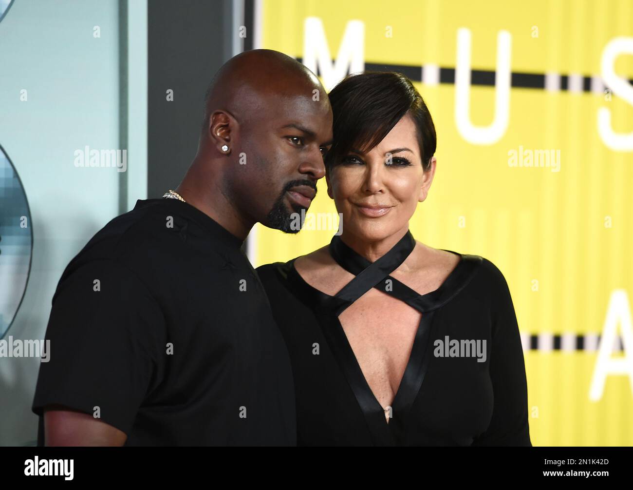 Corey Gamble, left and Kris Jenner arrive at the MTV Video Music Awards ...