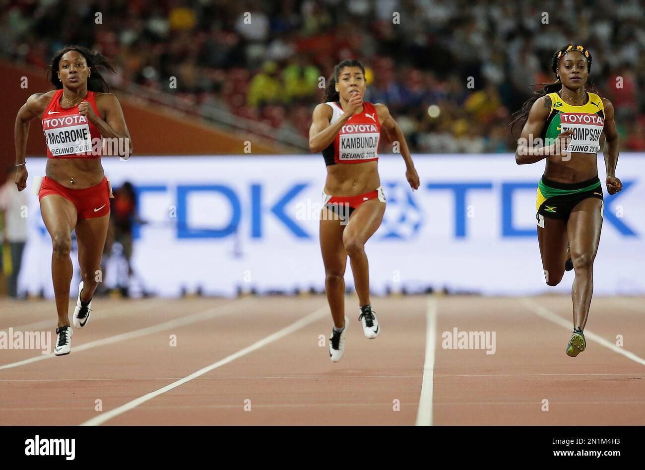 United States' Candyce Mcgrone, left, Switzerland's Mujinga Kambundji ...