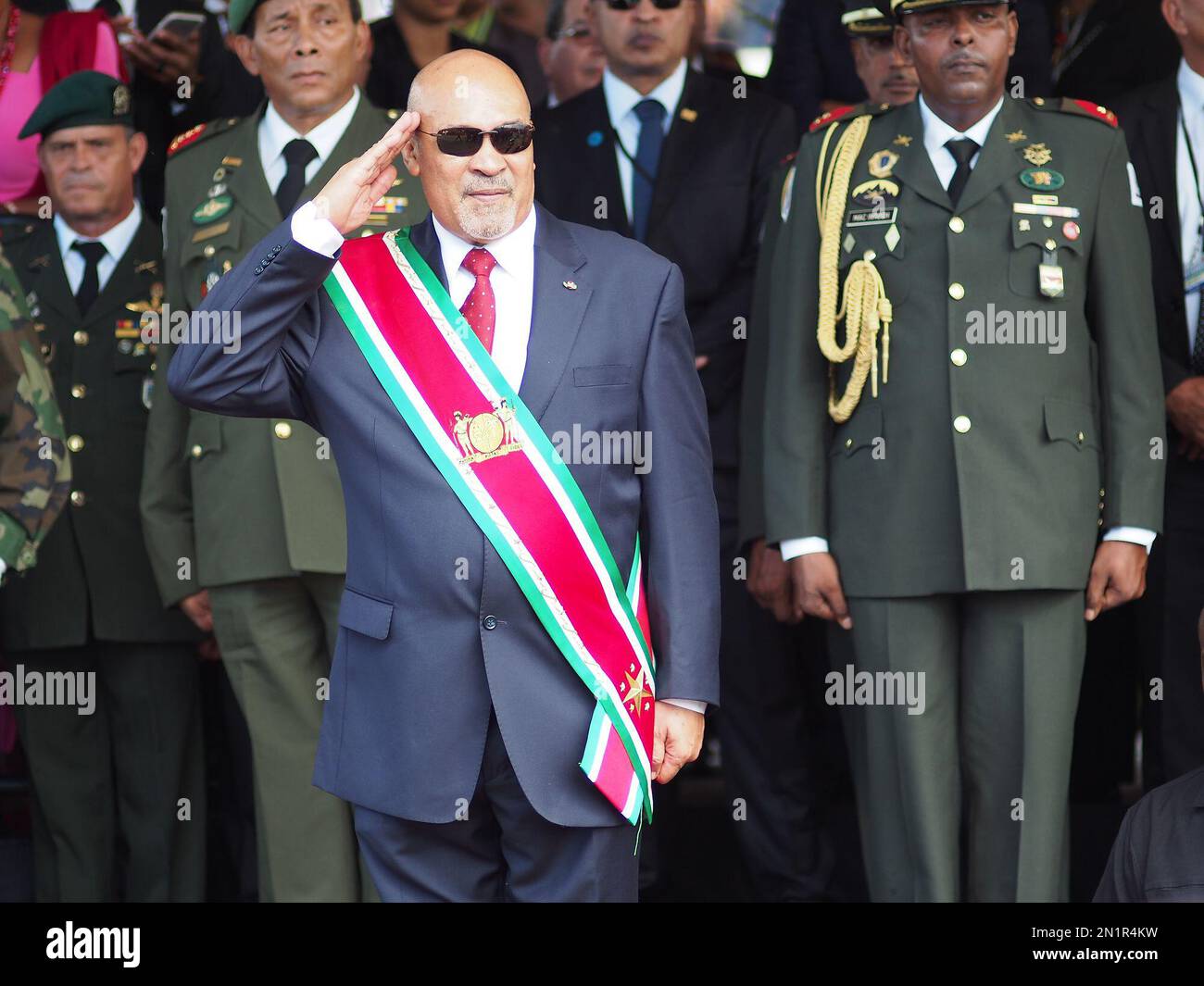 Suriname President Desire Delano Bouterse salutes during a military ...