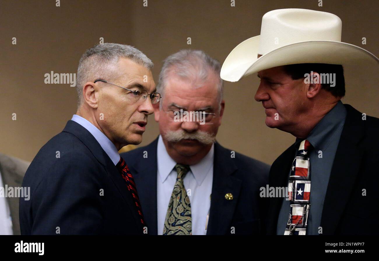 Texas Department of Public Safety Deputy Director Steve McCraw, left ...