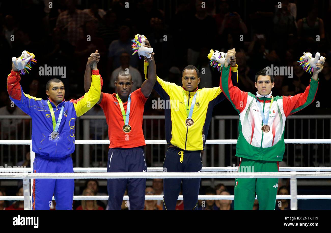 Gold medalist in men’s light heavyweight boxing, Cuba’s Julio La Cruz ...