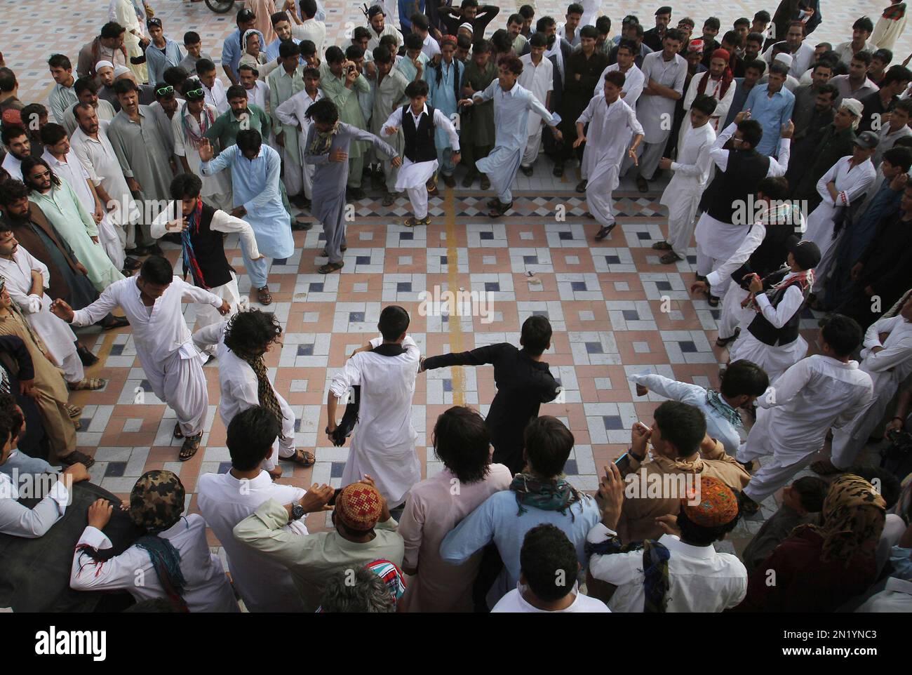 Pakistani Pashtun people perform their traditional dance at Clinfton ...