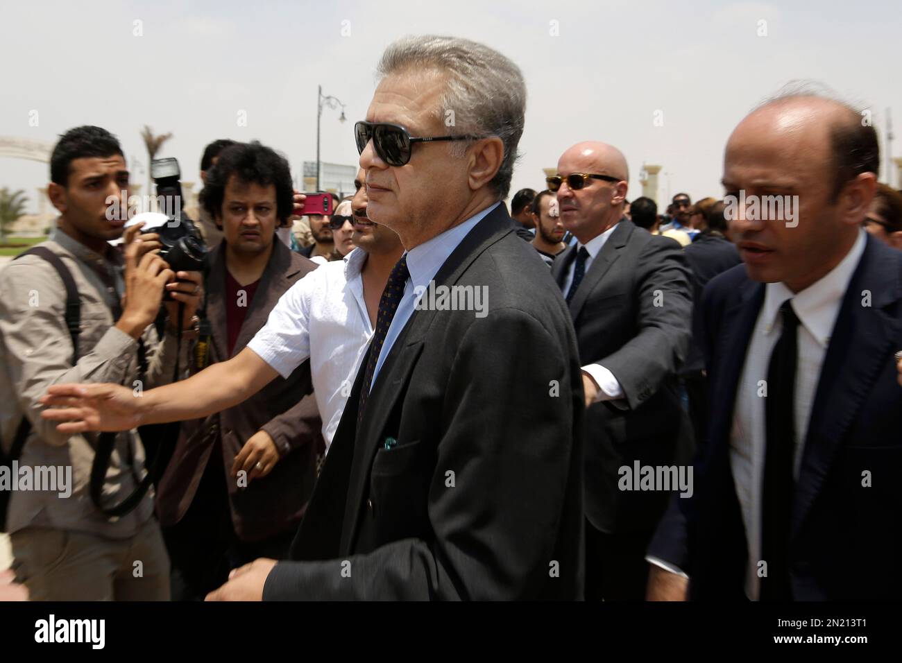 Tarek El-Sharif, center, arrives to his fathers funeral Egyptian actor Omar Sharif at the ...