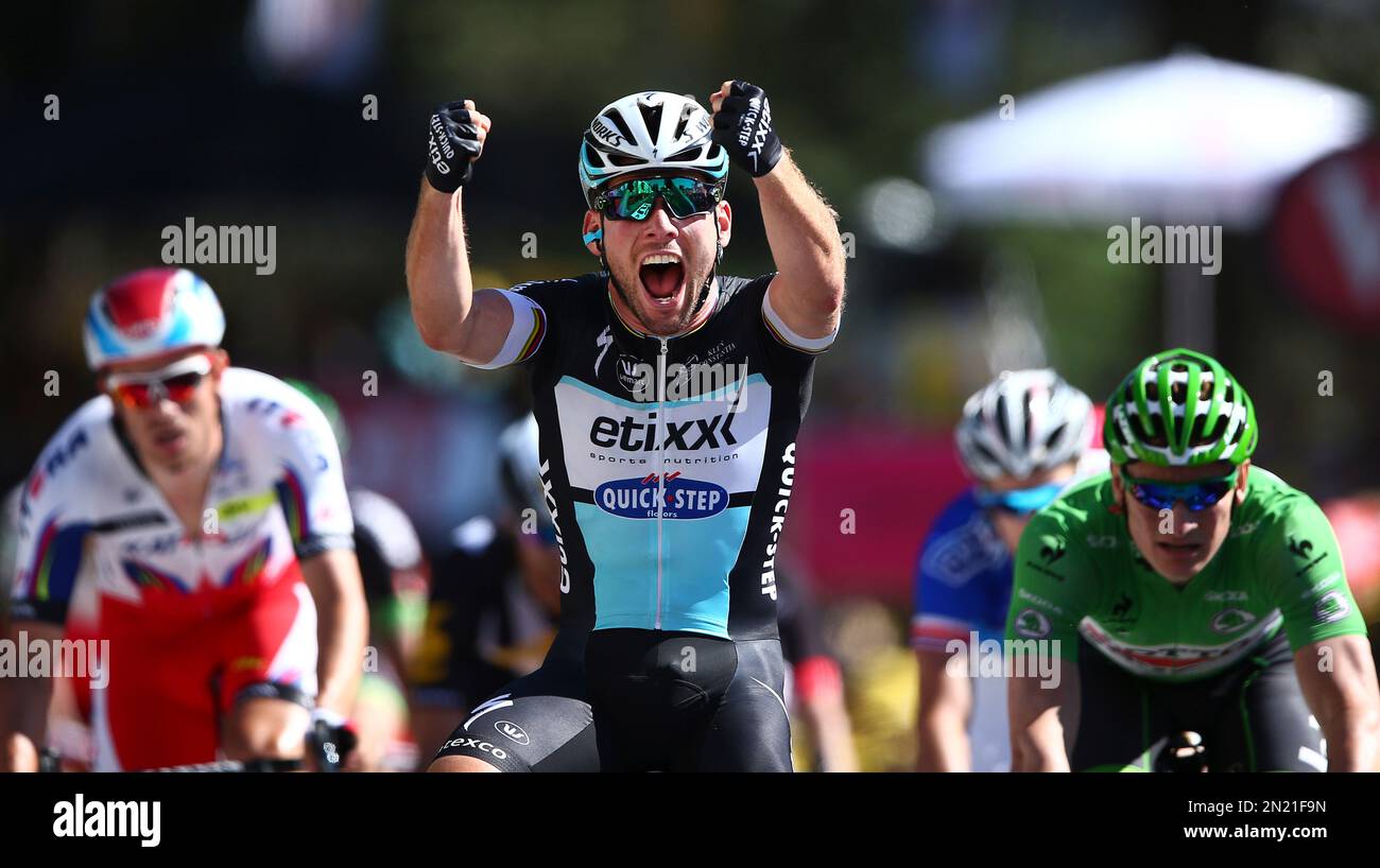 Britain's sprinter Mark Cavendish celebrates as he crosses the finish ...