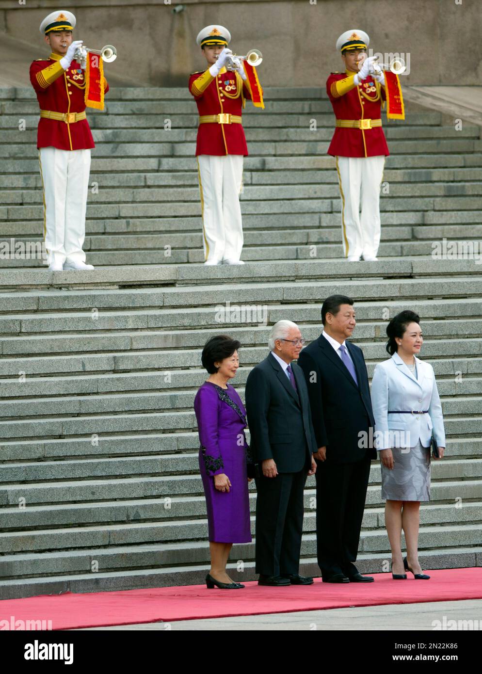 Chinese President Xi Jinping, second from right, and his wife Peng Liyuan, right, and ...