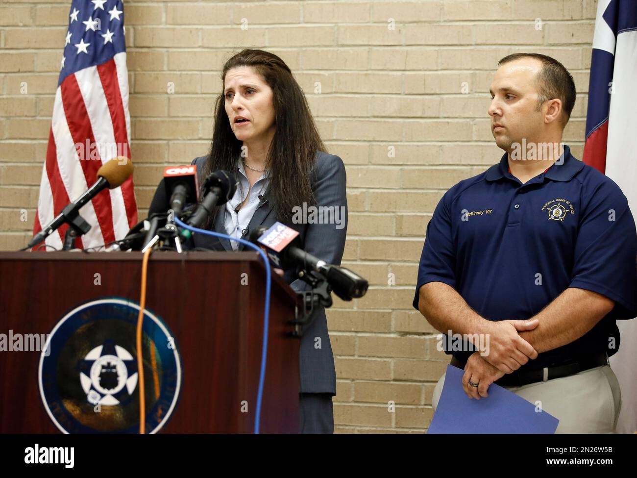 Jane Bishkin, left, the Dallas County Police Officer's Association ...