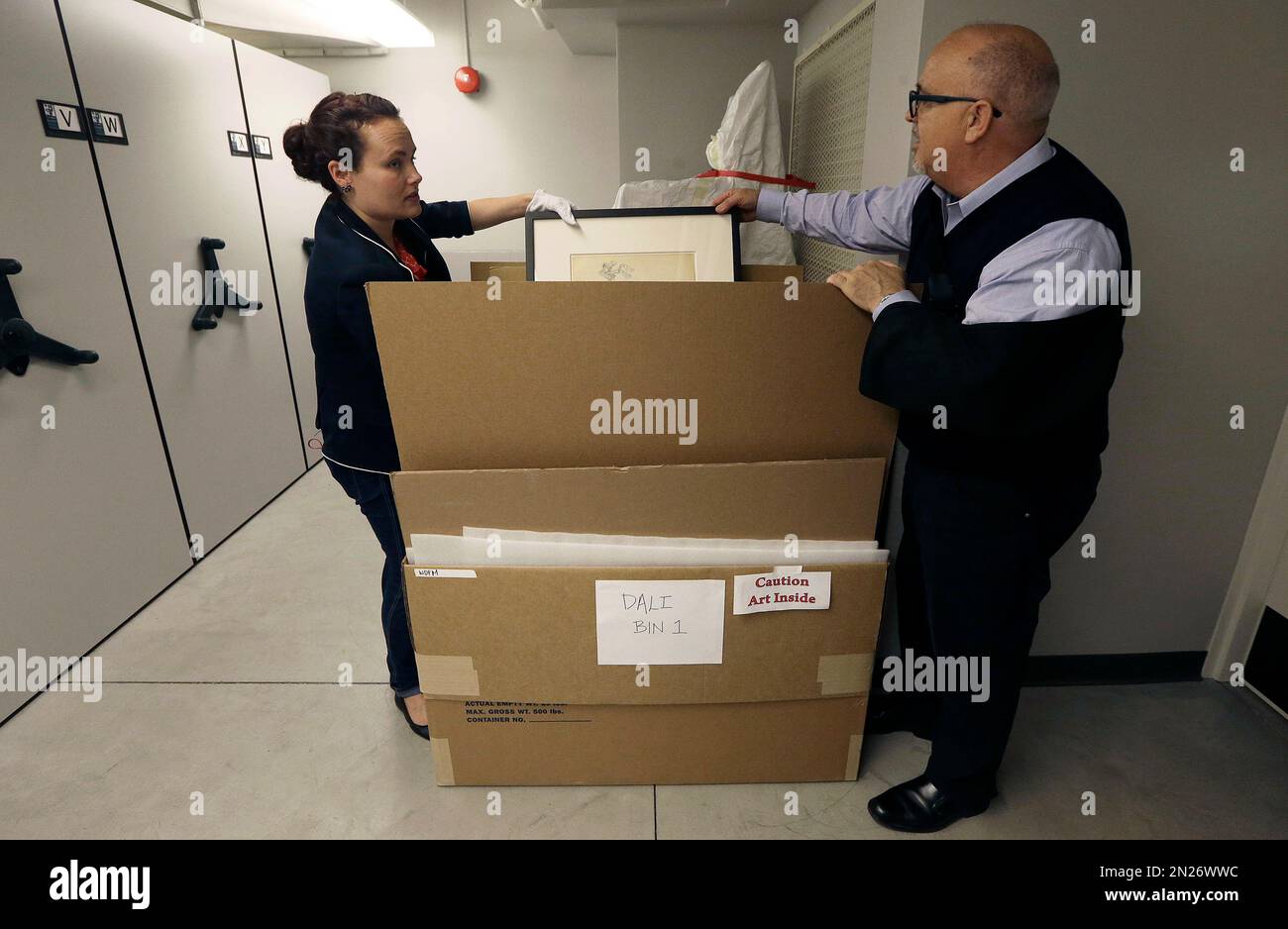 In this May 1, 2015 photo, Michael Labrie, director of collections and ...