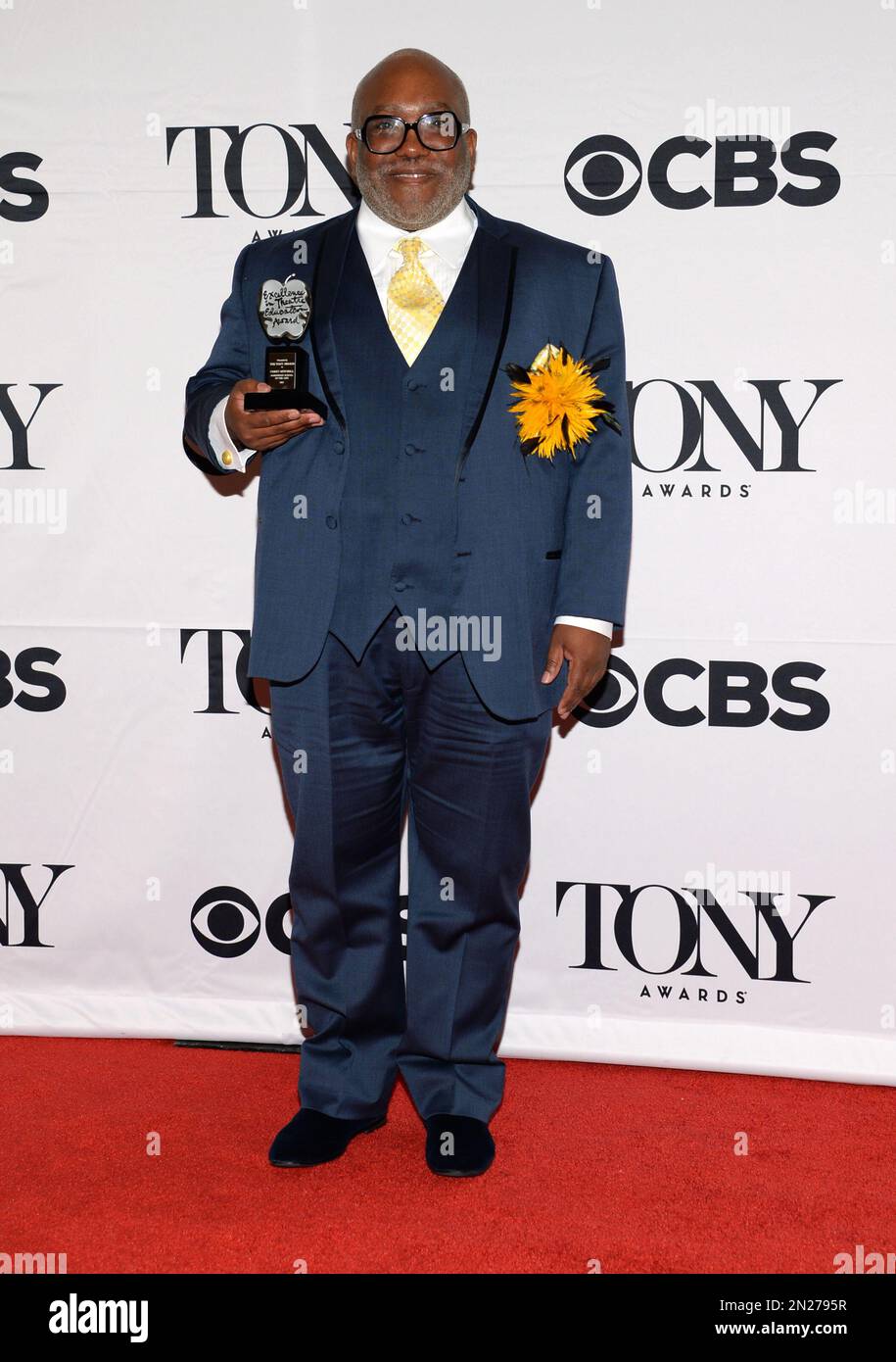 Corey Mitchell poses in the press room with the excellence in theater ...