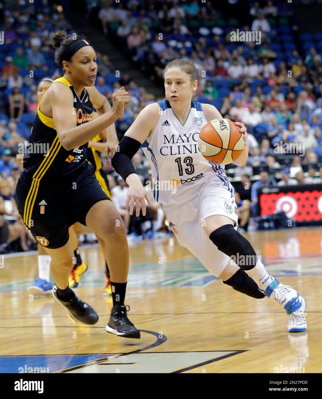 Minnesota Lynx guard Lindsay Whalen (13) drives to the basket against ...