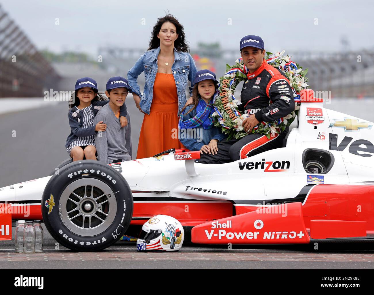 Juan Pablo Montoya, of Colombia, poses with his family, left to right ...