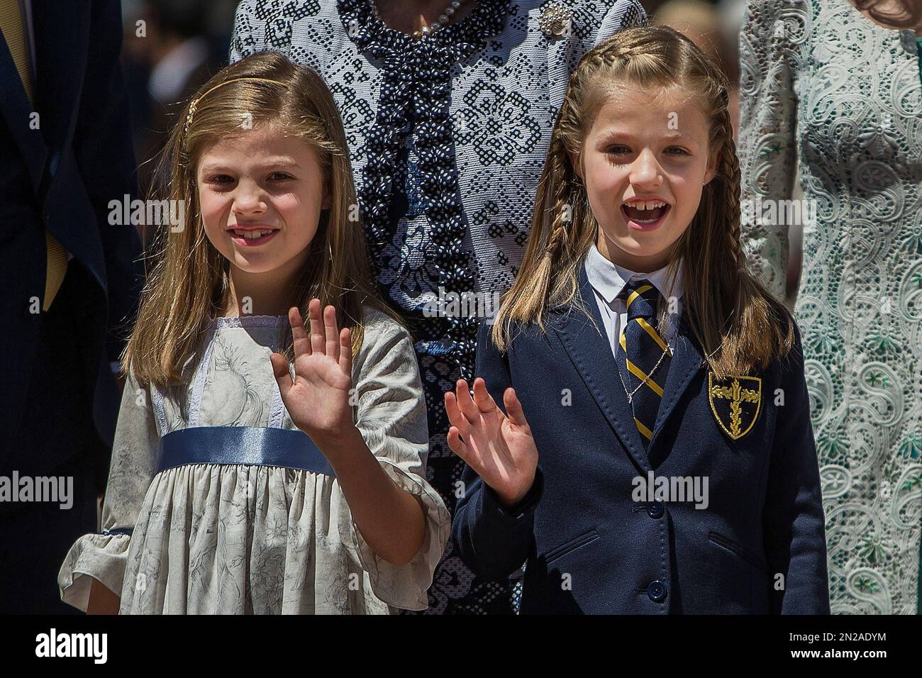 Princess Sofia, left, and Crown Princess Leonor, right, wave as they ...