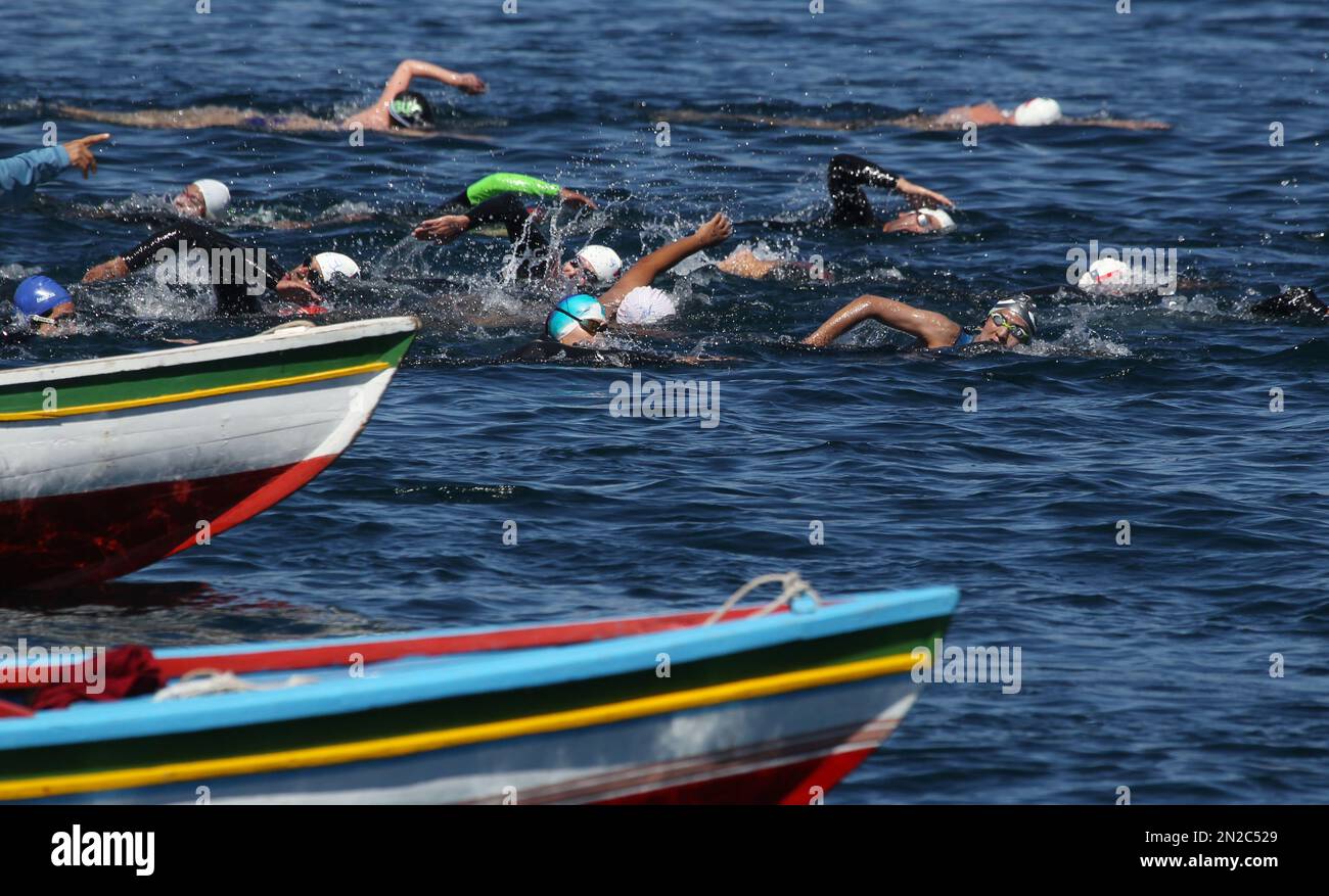 Athletes swim in Titicaca lake during the ninth edition of the ...