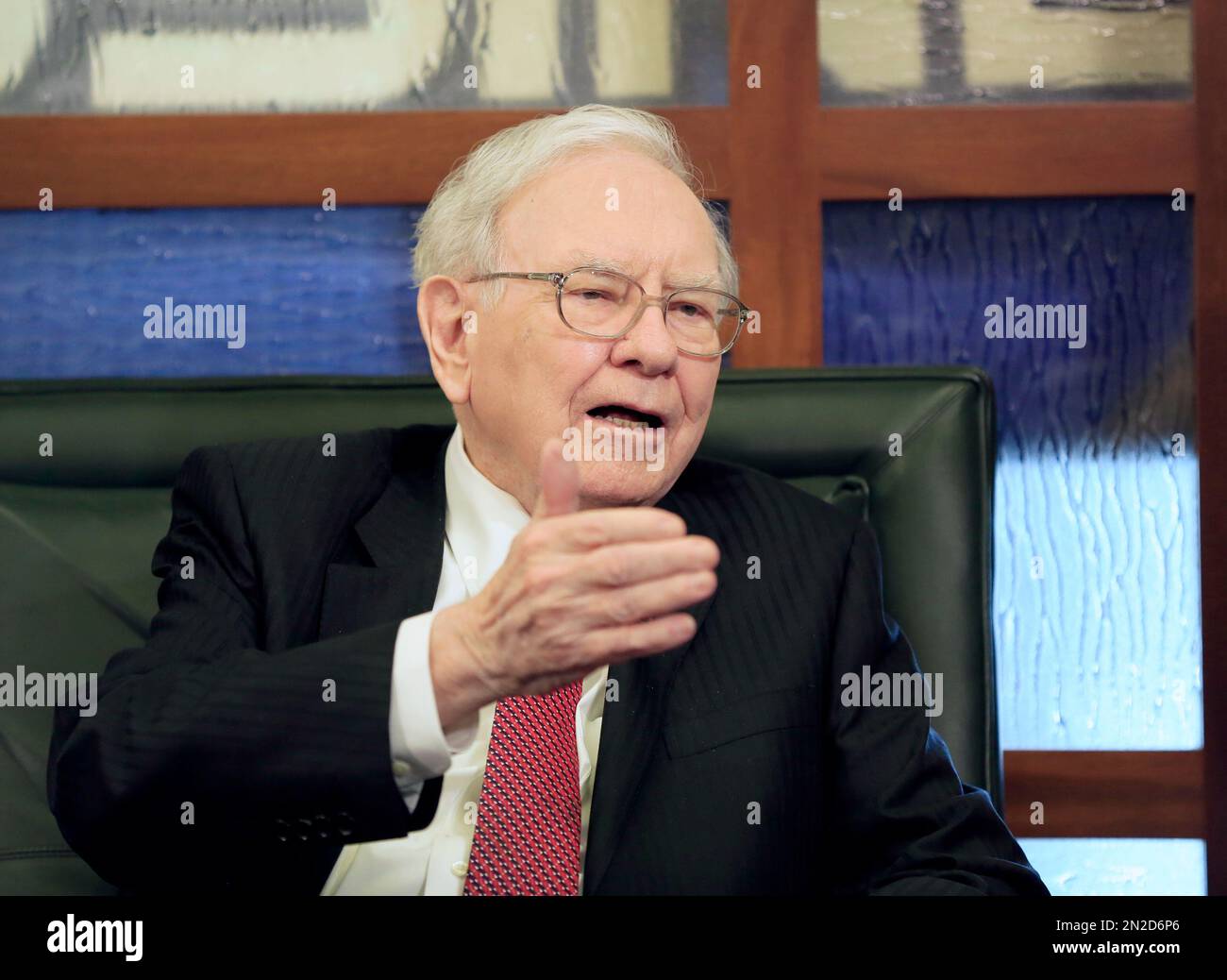 Berkshire Hathaway Chairman and CEO Warren Buffett speaks during an ...