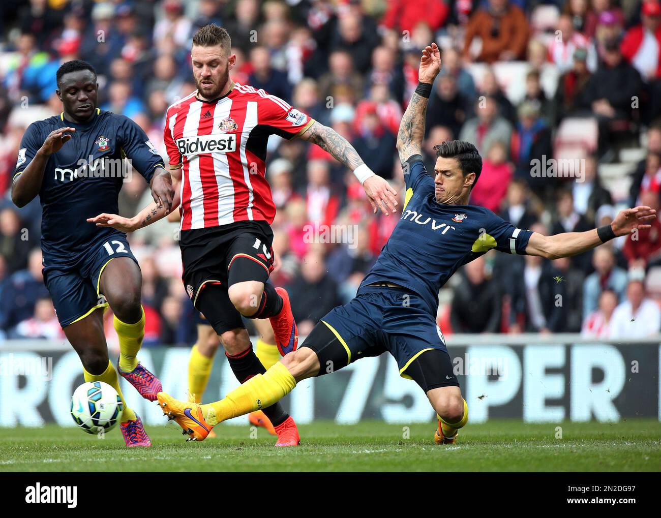 Sunderland's Connor Wickham, center, vies for the ball with Southampton ...