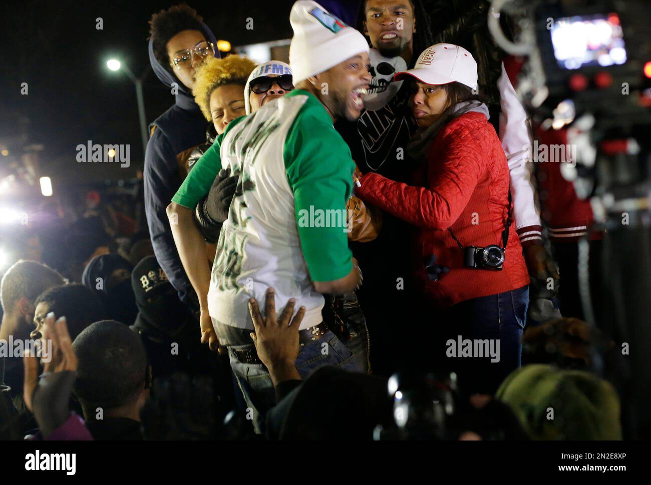 FILE - In this Nov. 24, 2014 file photo Louis Head, center front ...