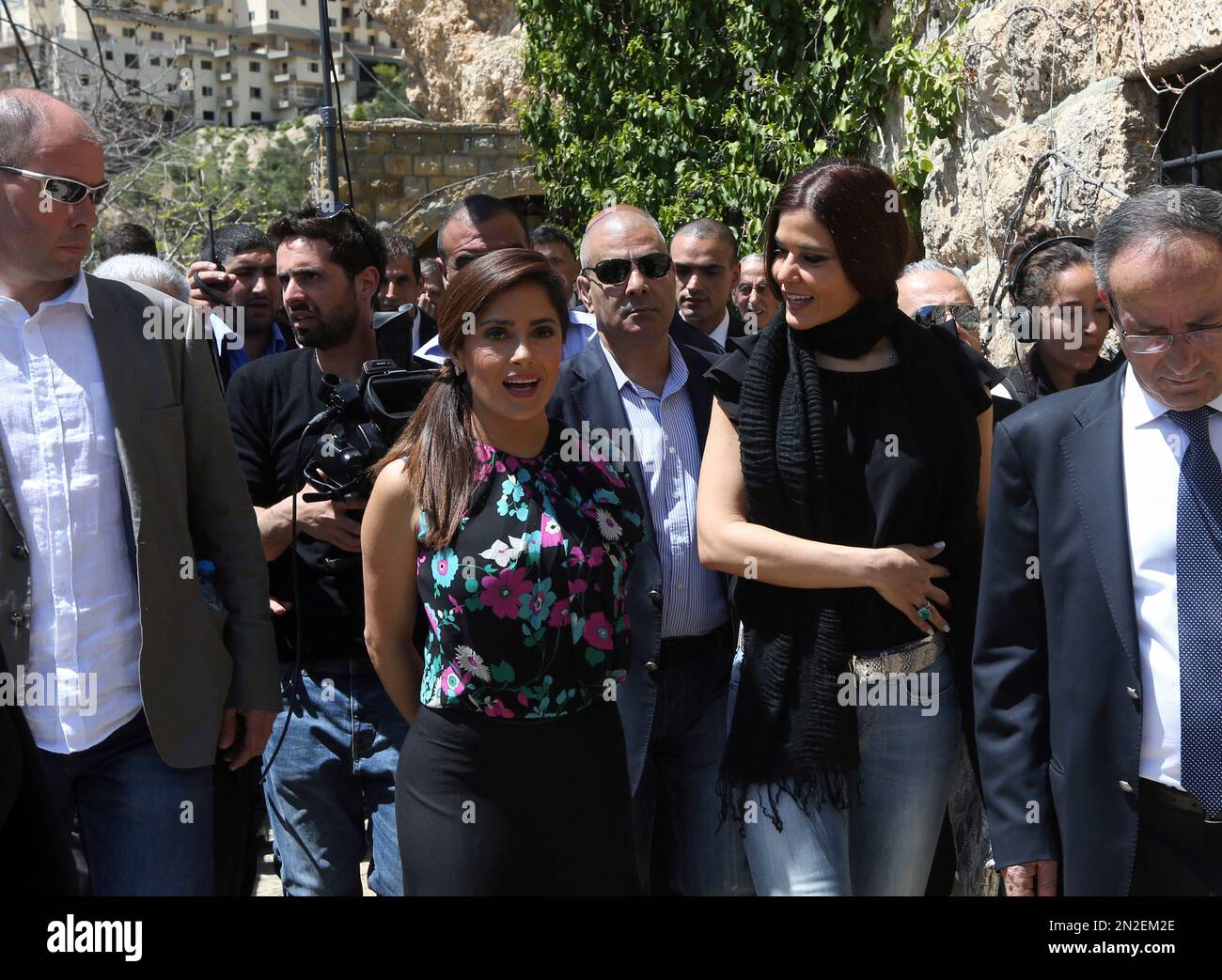 Mexican and American actress Salma Hayek, second left, speaks with ...