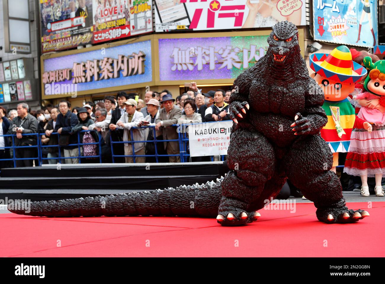 Godzilla poses on the red carpet during a ceremony in downtown Tokyo ...