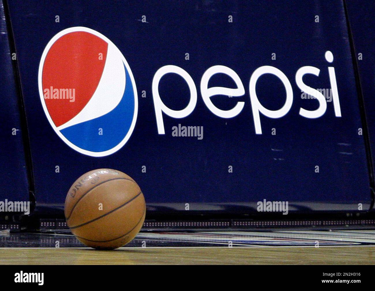 FILE - In this Oct. 7, 2009 file photo, a court side ad displays the ...