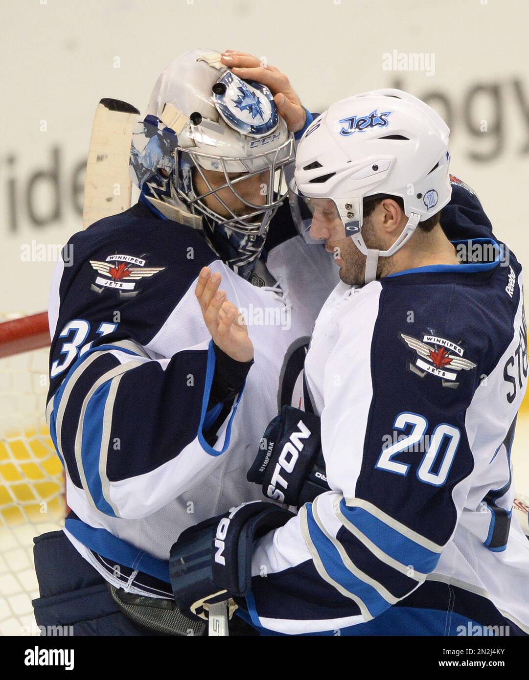 Winnipeg Jets' goalie Ondrej Pavelec (31), of Czech Republic, is ...