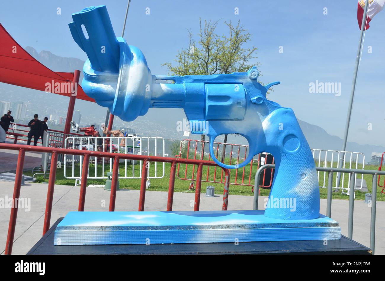 A knotted gun sculpture painted by Japanese artist and peace activist ...