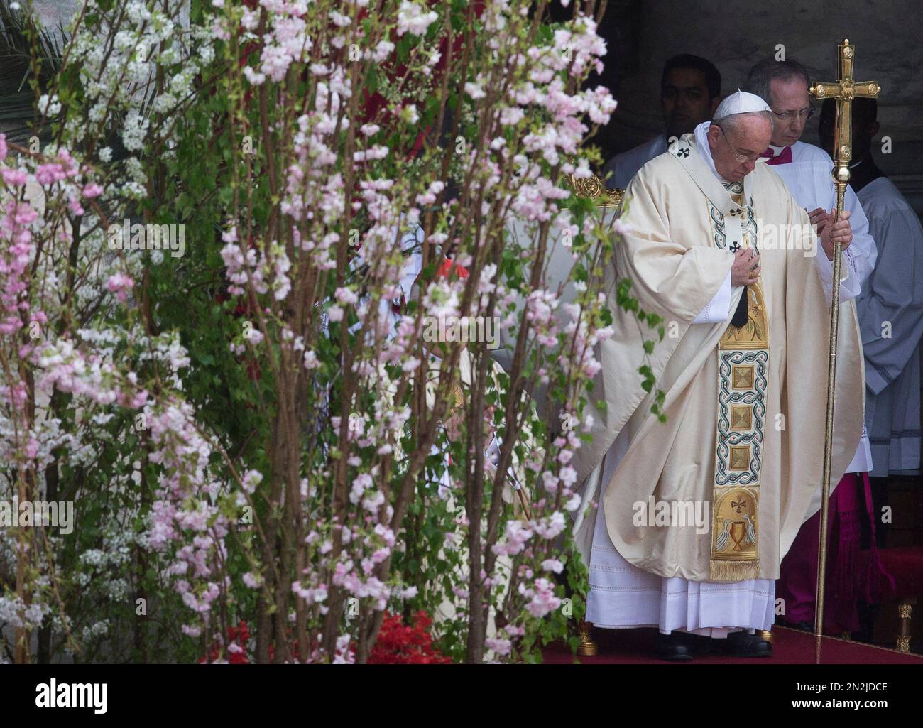 Pope Francis holds the pastoral staff as he celebrates the Easter Mass ...
