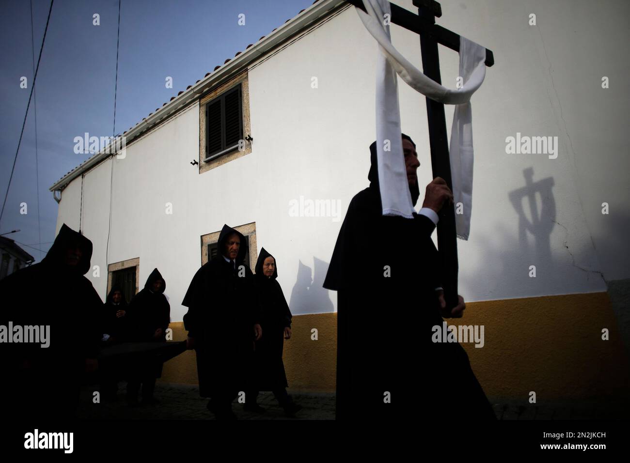 Members of the "Misericordia" brotherhood take a part in a procession ...