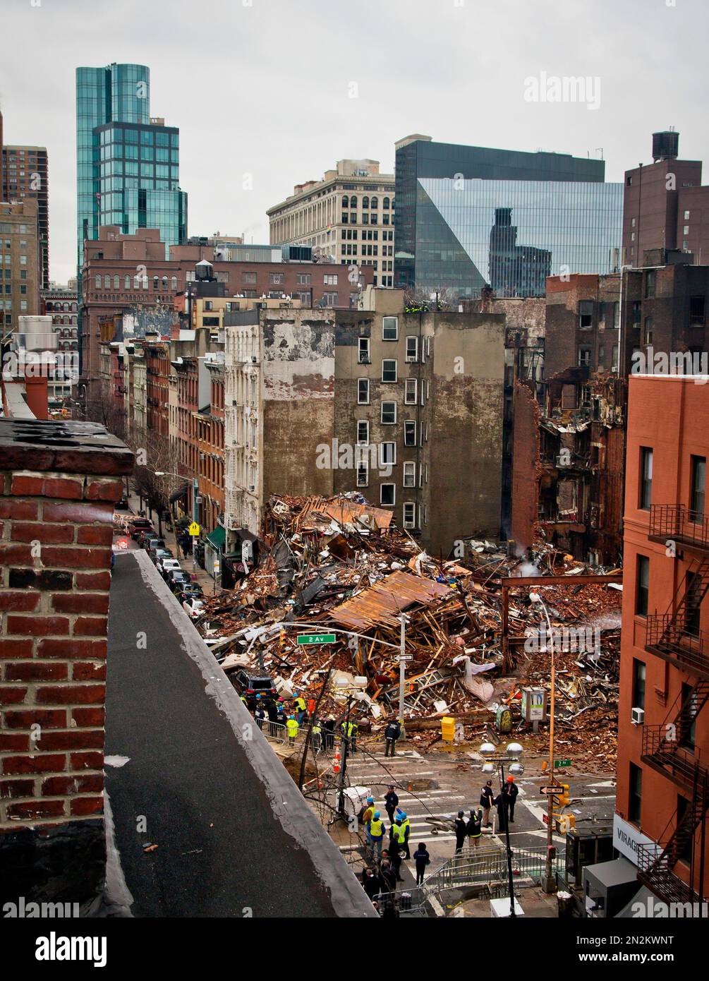 A debris pile remains in the aftermath of a building collapse following ...