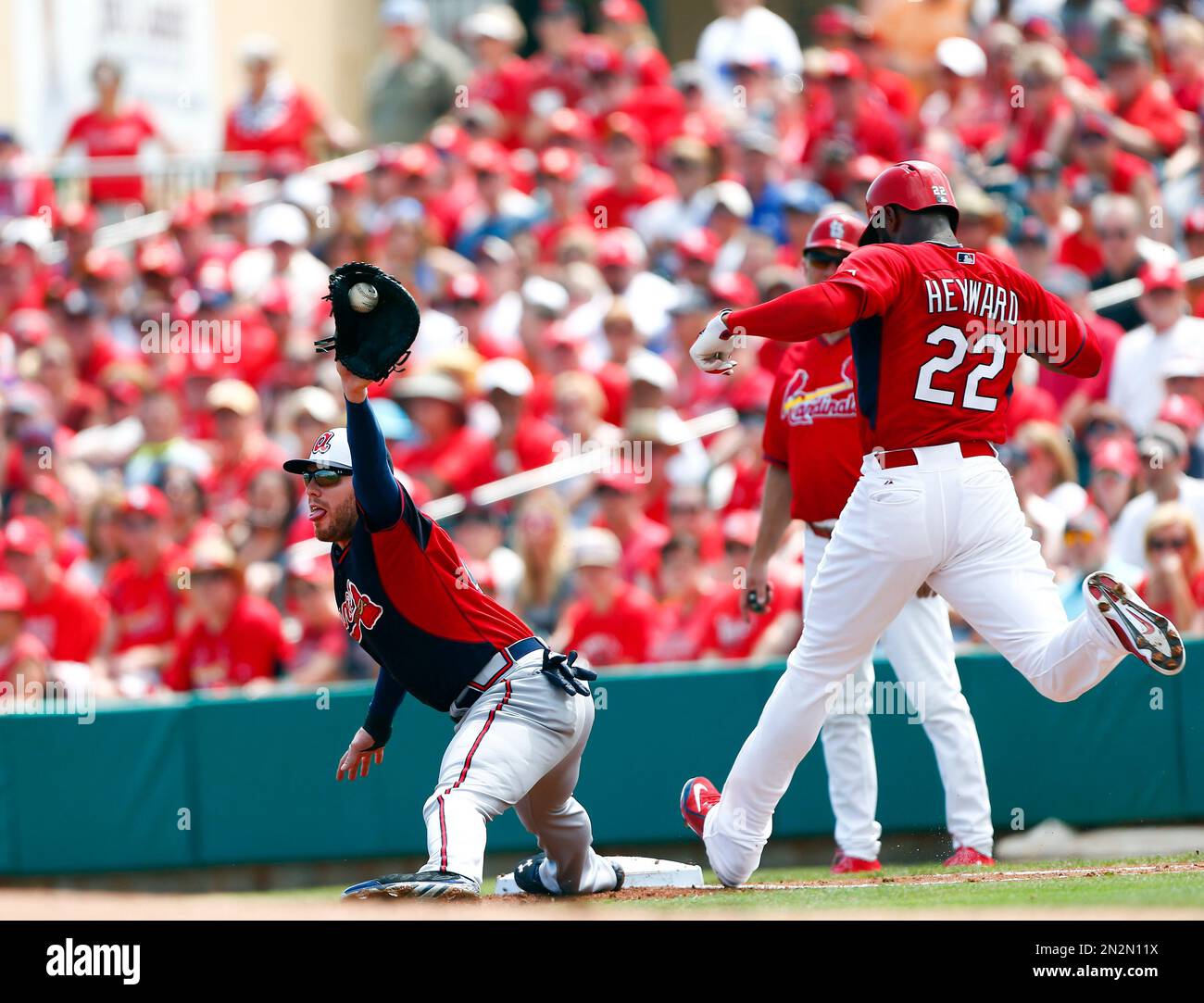 St. Louis Cardinals' Jason Heyward (22) is out at first base as Atlanta ...