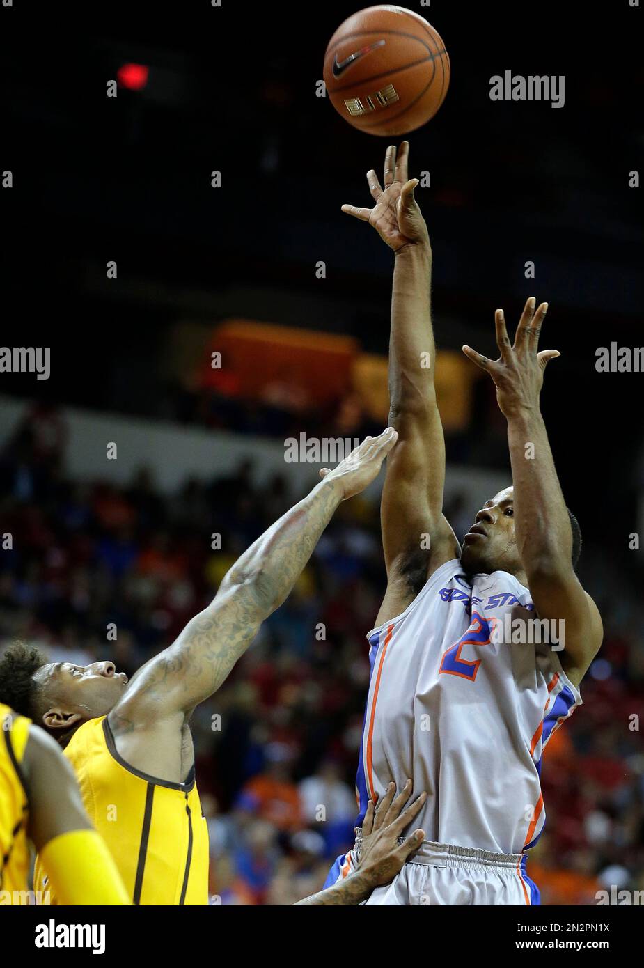 Boise State's Derrick Marks shoots over Wyoming's Charles Hankerson Jr ...