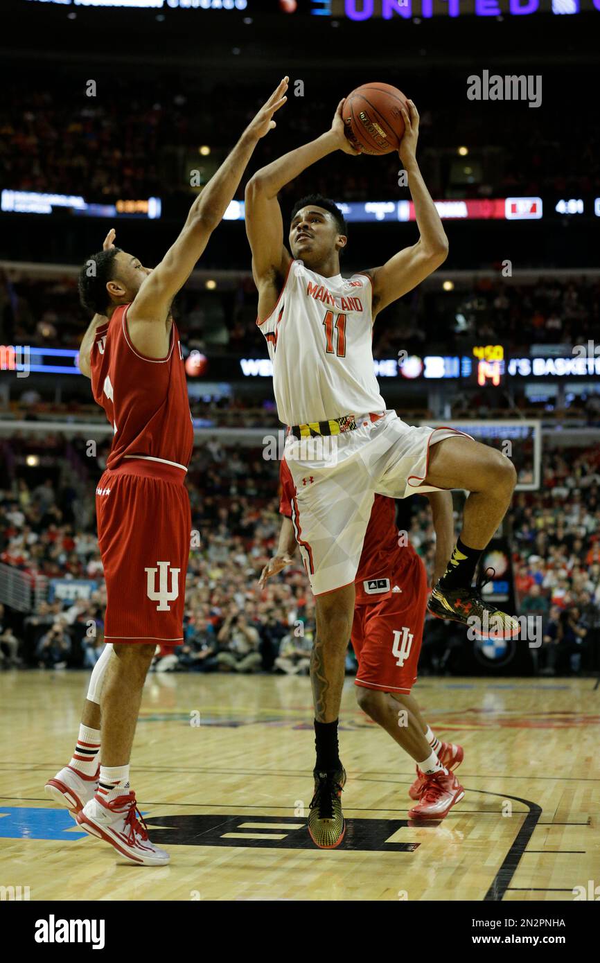 Maryland's Jared Nickens (11) shoots over Indiana's James Blackmon Jr ...
