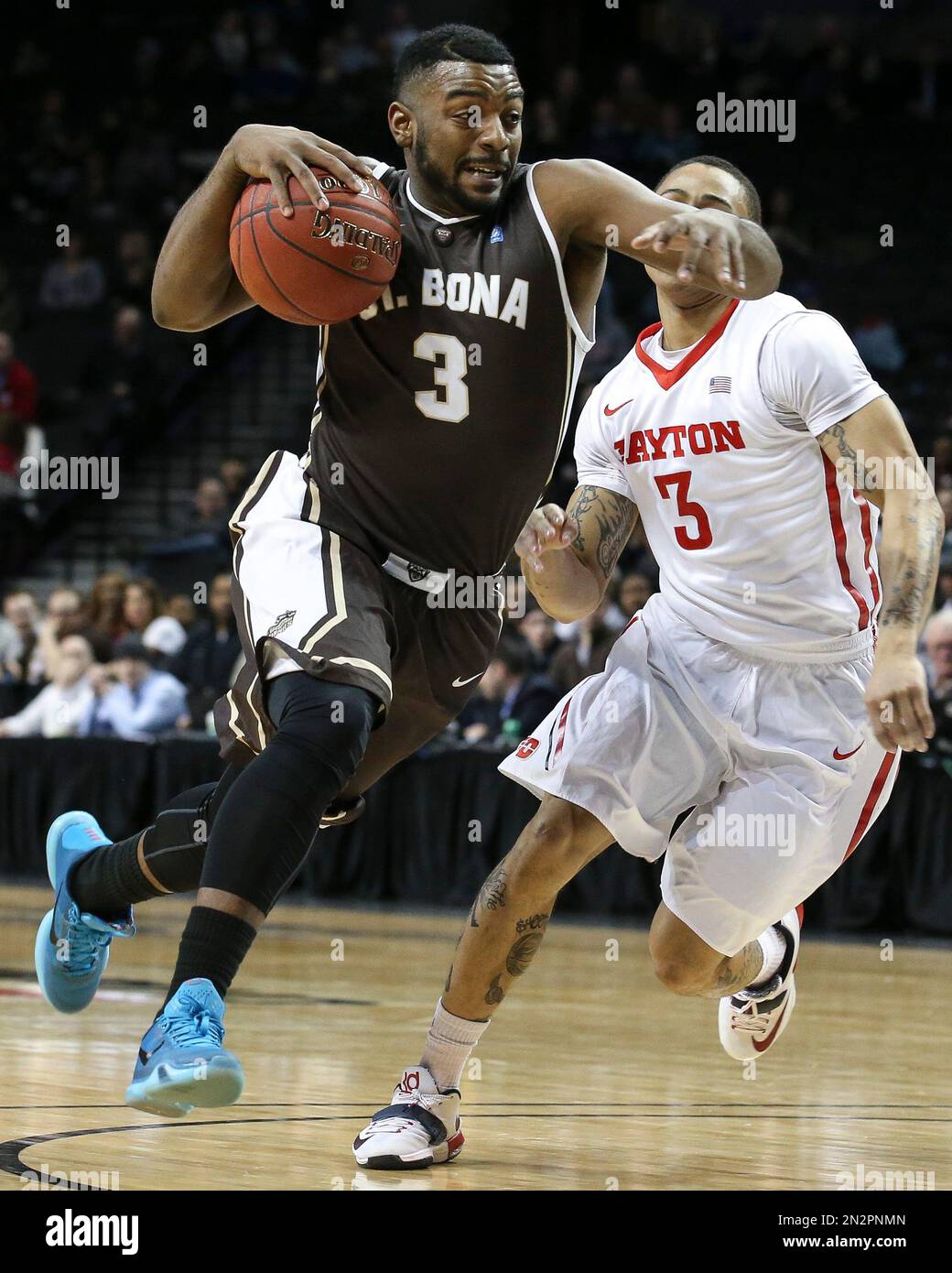 St. Bonaventure guard Marcus Posley (3) drives past Dayton guard Kyle ...