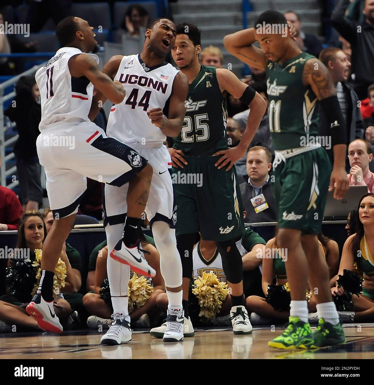 Connecticut’s Ryan Boatright, left, and Rodney Purvis reacts as South ...