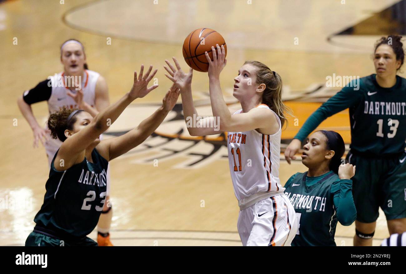 Princeton guard Blake Dietrick (11) takes a shot past Dartmouth center ...
