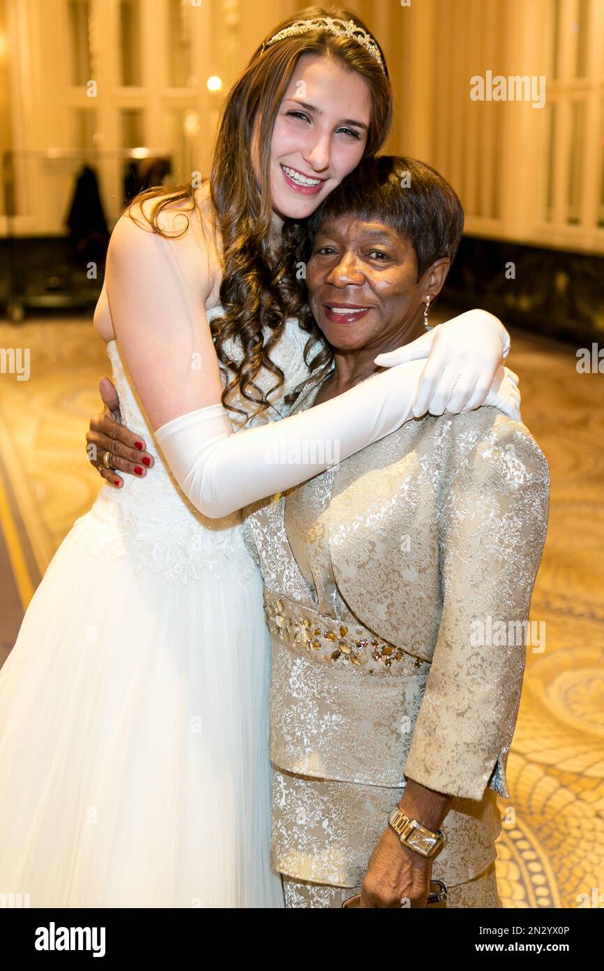 Leah Lane poses for a portrait in her Oleg Cassini ballgown with ...