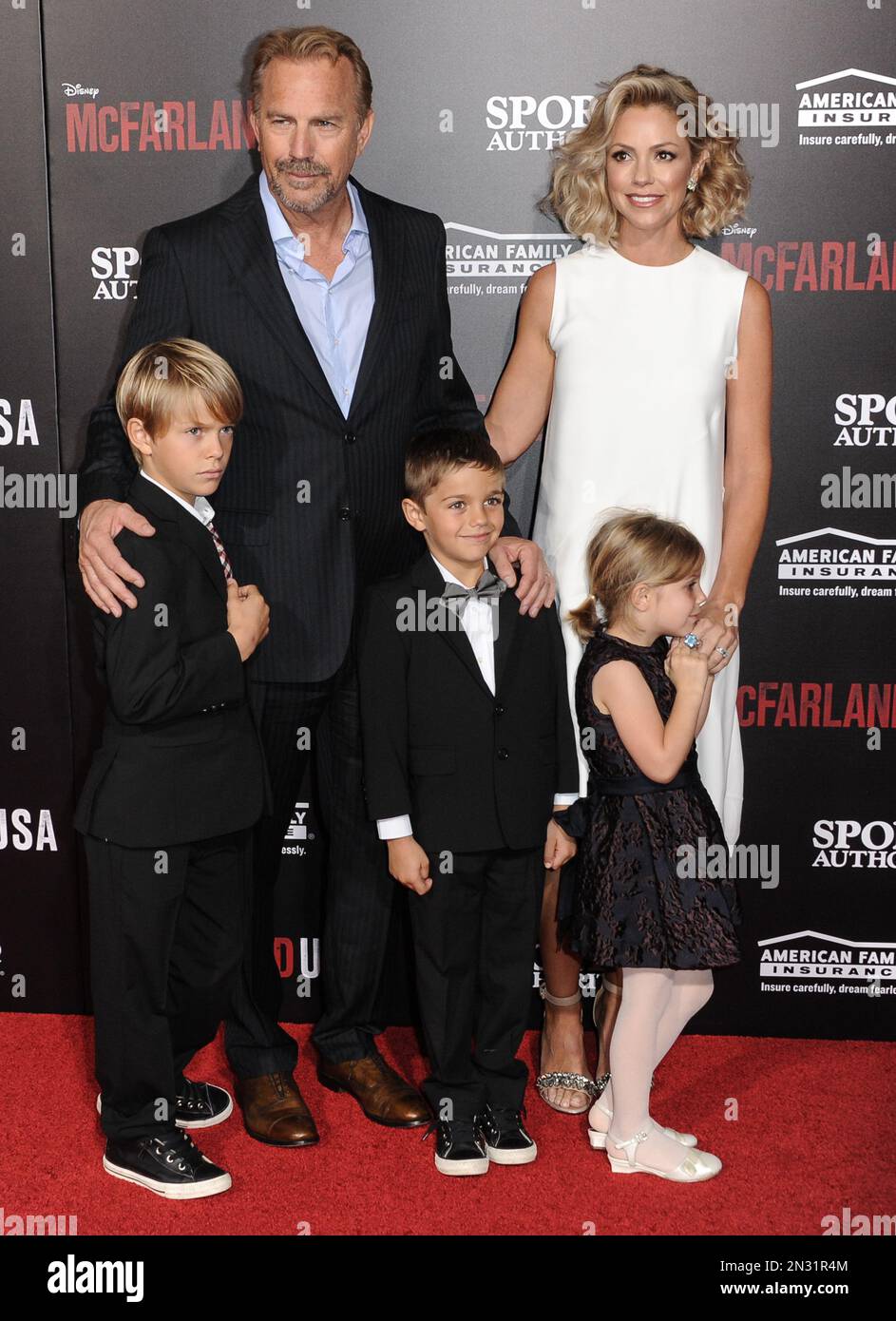 From left, Kevin Costner, Christine Baumgartner, Hayes Logan Costner ...