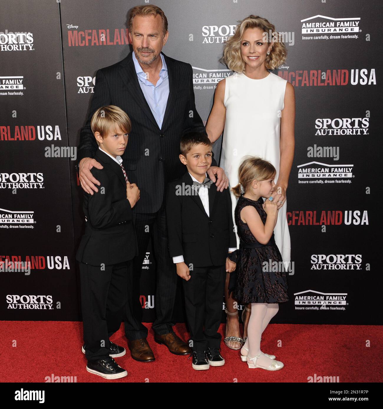 From left, Kevin Costner, Christine Baumgartner, Hayes Logan Costner ...