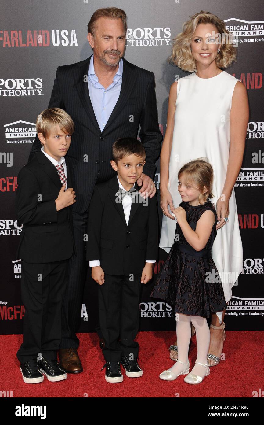 From left, Kevin Costner, Christine Baumgartner, Hayes Logan Costner ...