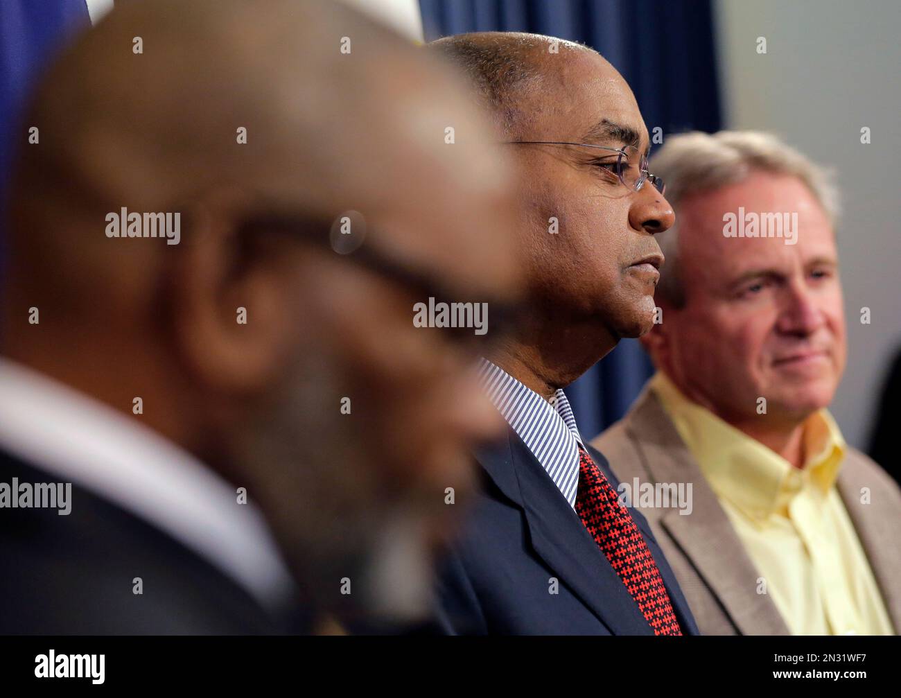 Sen. Rodney Ellis (D-Houston), center, stands with exonerees Billy ...
