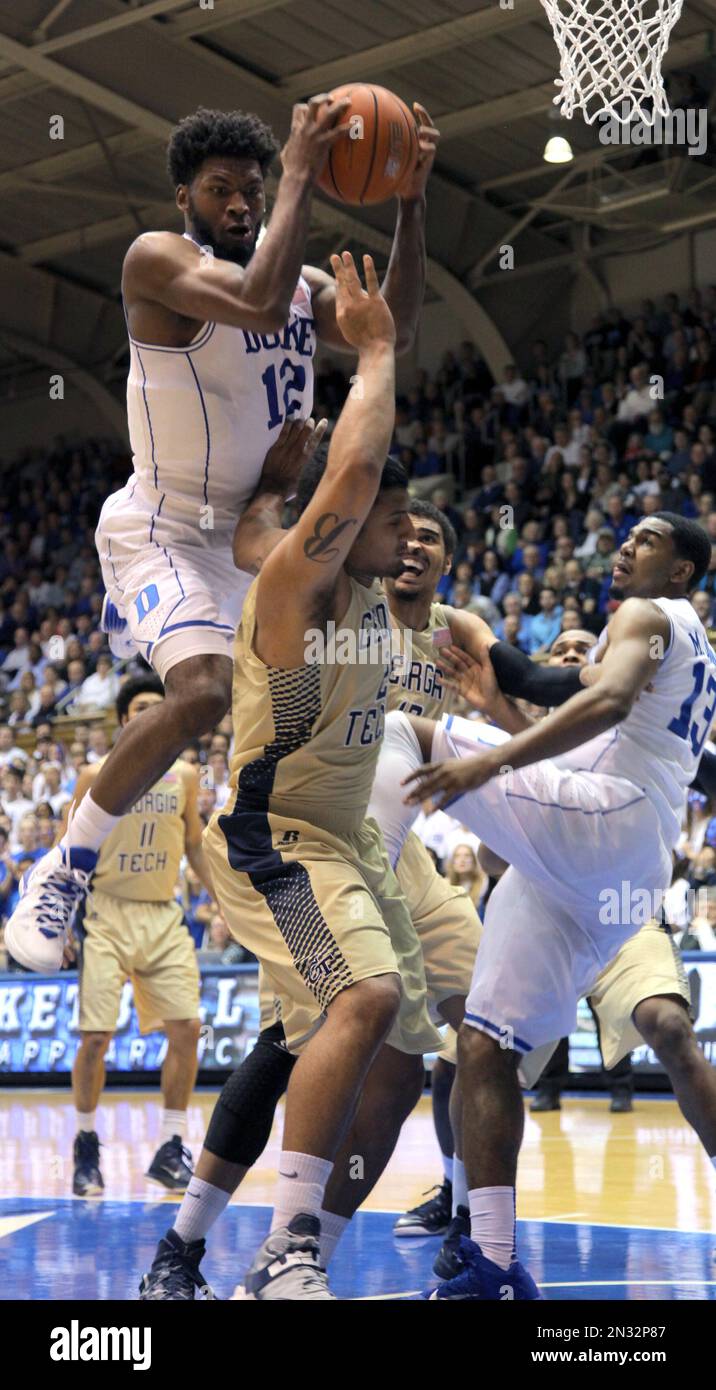 Duke's Justise Winslow grabs an offensive rebound above Georgia Tech's ...