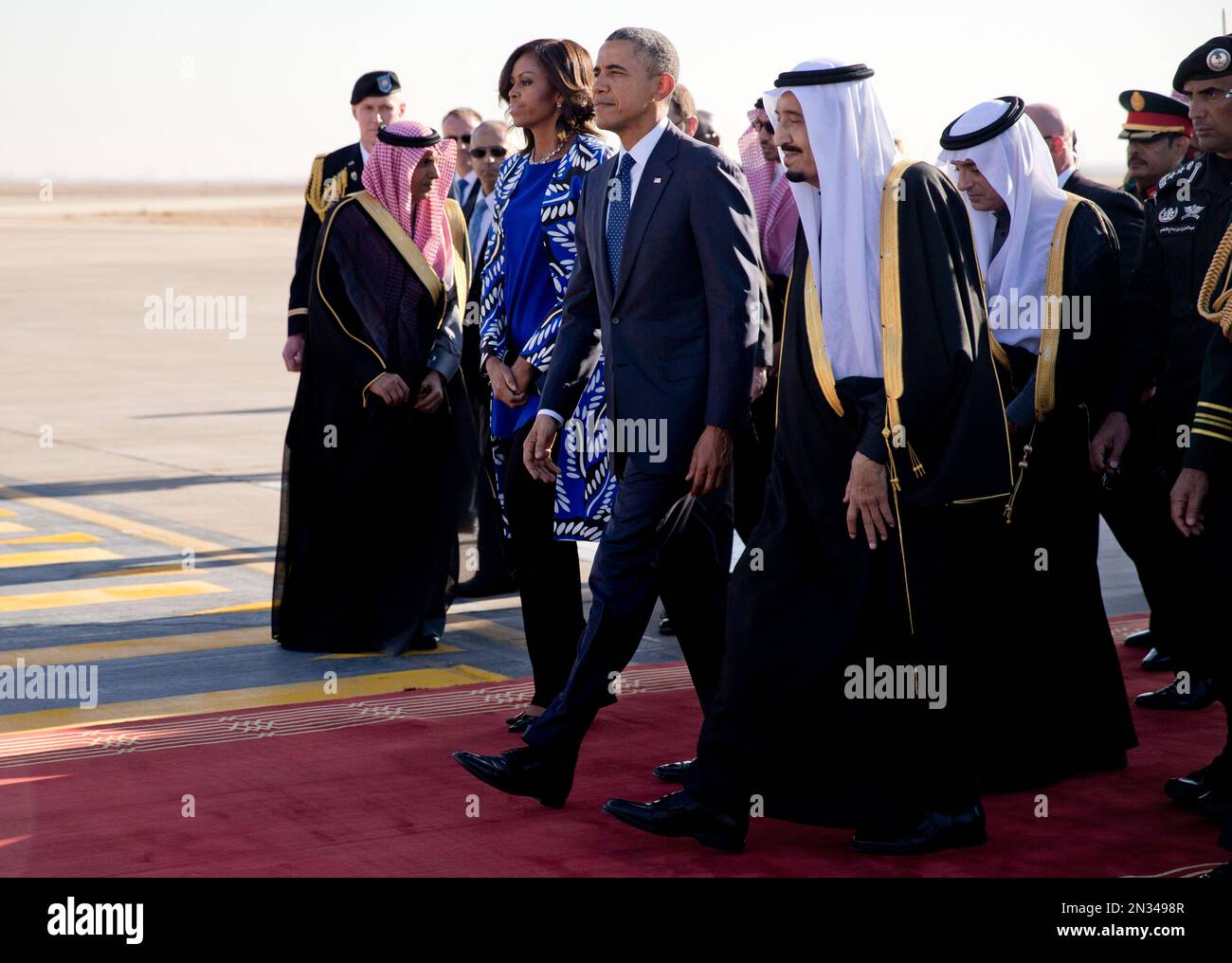 President Barack Obama and first lady Michelle Obama walks with new ...